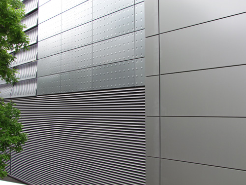 Three of the profiles and panels integrated into the metal envelope ...